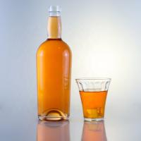 China Unique Design 700ml 750ml Brandy Vodka Tequila Glass Bottle With Cork Customized Logo for sale