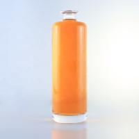 China 750ml Unique Round Flint Glass Bottle with Customized Logo and Cork for sale