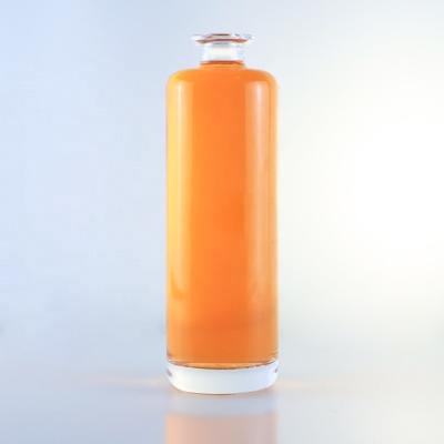 China 750ml Unique Round Flint Glass Bottle with Customized Logo and Cork for sale