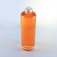 China 750ml Unique Round Flint Glass Bottle with Customized Logo and Cork for sale