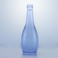 China Glass Collar Unique Design 2022 Empty Blue Clear Bottle for Gin Whisky Rum Tequila Brandy for sale