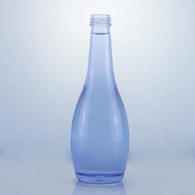 China Glass Collar Unique Design 2022 Empty Blue Clear Bottle for Gin Whisky Rum Tequila Brandy for sale