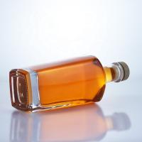 China Hot Stamping Surface Handling Clear or Customized Color 750ml Rum Vodka Liquor Glass Bottle for sale