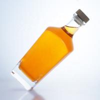 China Hot Stamping Surface Handling Clear or Customized Color 750ml Rum Vodka Liquor Glass Bottle for sale