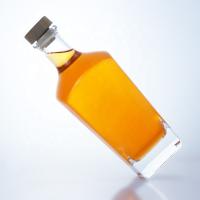 China Hot Stamping Surface Handling Clear or Customized Color 750ml Rum Vodka Liquor Glass Bottle for sale