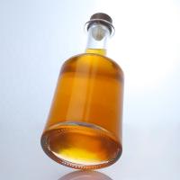China Surface Handling Hot Stamping Glass Bottle With Cork for Vodka Gin Rum Whiskey for sale