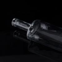 China 1750ml 1000ml Glass Bottles for Liquor Customized Round Vodka Bottle Versatile Usage for sale
