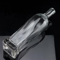 China 750ml Super Flint Round Shoulder Square Based Rum Vodka Liquor Glass Bottle With Cork for sale