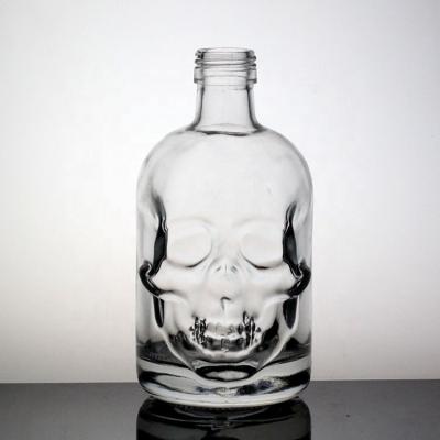 China Exquisite Frost Glass Skull Face Bottle For Liquor Decal Surface Handling for sale