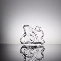 China Exquisite Frost Glass Skull Face Bottle For Liquor Decal Surface Handling for sale