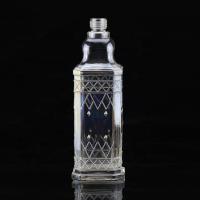 China Glass Body Carved Empty Liquor Bottle 500ml 750ml for High Grade Distilled Spirits for sale