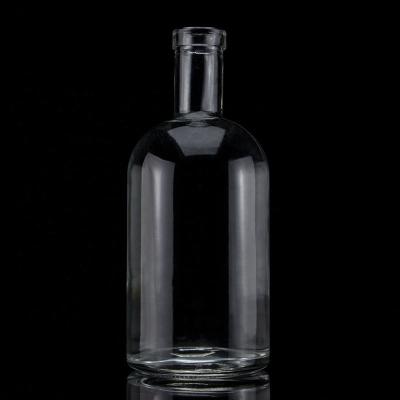 China Base Material Glass Liquor Bottle 500ml 700ml 750ml with Cork Seal and Round Shape for sale