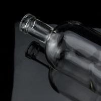 China Base Material Glass Liquor Bottle 500ml 700ml 750ml with Cork Seal and Round Shape for sale