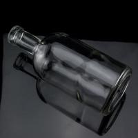 China Base Material Glass Liquor Bottle 500ml 700ml 750ml with Cork Seal and Round Shape for sale