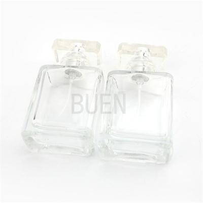 China 50ml Square Transparent Perfume Bottle With Multicolor Cap for sale