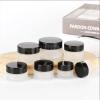China Frosted Cream Glass Small Cosmetic Containers Round Gold Cap for sale