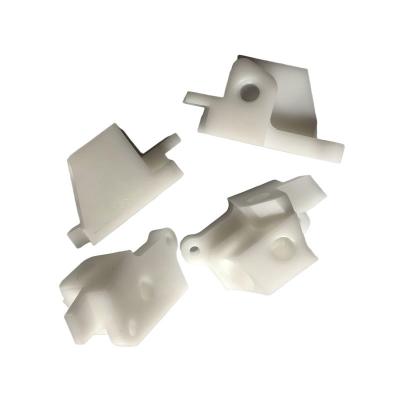 China ISO9001 Certified White Acetal CNC Machined Parts with ±0.002~0.005mm Tolerance for Electronics Box for sale