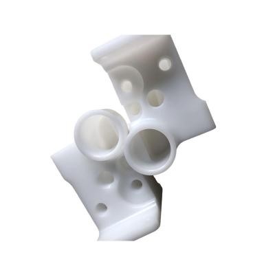 China Custom Precision CNC Machining Parts with White Acetal Material and ±0.002~0.005mm Tolerance for Electronics Box for sale