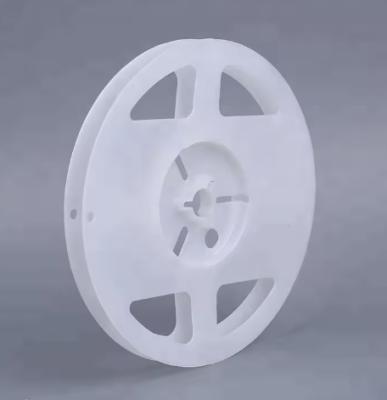 China Eco-friendly PS Plastic Spool, 7-inch Size, Available in 8/12/16mm Widths, with Black/White/Milky White Color Options for sale