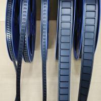 China 44mm and 56mm Black Embossed PS Tape for Electronic Component Protection and Transport for sale