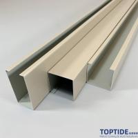 China Suit for Airport Building Materials Wood Grain Color Suspended Aluminium Curved Tube Baffle Ceiling for sale