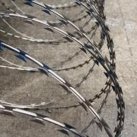China Anti Theft Galvanized Barbed Wire Concertina Coil Military Grade Wall Protection Fence for sale