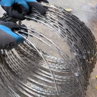 China Customized Stainless Steel Barbed Razor Concertina Coil Wire High Tensile Prison Fence for sale