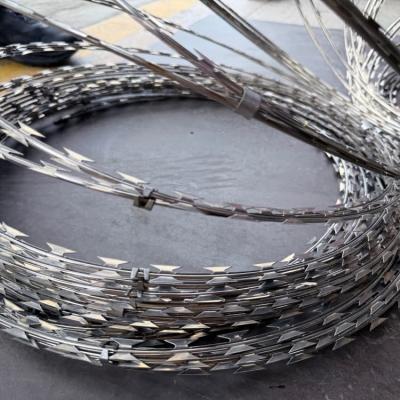 China Heavy Duty Razor Barbed Tape / Long Life Concertina Coil for Factory Fence for sale