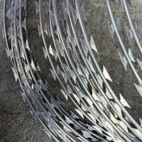 China CBT-65 Concertina Razor Wire / Stainless Steel Spiral Barrier for Border Control for sale