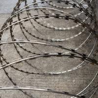 China High Tensile Steel BTO-30 Concertina Barbed Wire Galvanized Blade Coil For Factory Fencing for sale