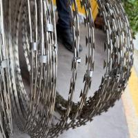 China Double Spiral Razor Wire / Welded Mesh Type High Security Coil For Prison And Military for sale