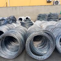 China BTO-22 Galvanized Razor Wire Anti Climb Concertina Coil For Prison Fence for sale