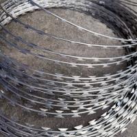 China 316 Marine Grade Barbed Wire Concertina Coil Salt Spray Resistant Barrier For Port Facilities for sale