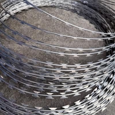 China 316 Marine Grade Barbed Wire Concertina Coil Salt Spray Resistant Barrier For Port Facilities for sale