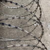 China BTO-22 Cross Type Concertina Barbed Wire Fencing / Diamond Mesh for Airport Security for sale