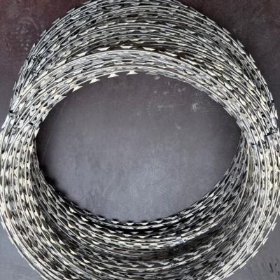 China Stainless Steel 304 Concertina Razor Wire High Security Spiral Barrier For Border Protection for sale