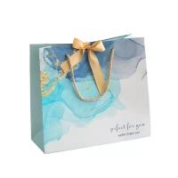 China Luxury Christmas Cosmetics Jewellery Paper Bag Shopping Tote Bag Art Paper for sale