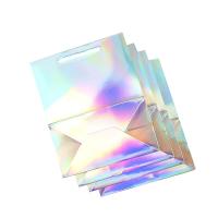 China boutique Custom Printed Paper Bags Holographic Shopping Bag With Ribbon Handle for sale