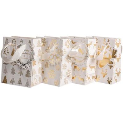 China Customized gold foiled logo paper gift shopping bag for sale