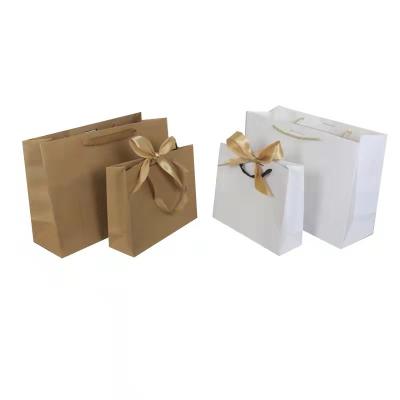 China luxury custom printed paper gift shopping bag brown kraft paper bag with your own logo for clothing jewelry for sale