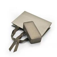 China Varnishing Surface Custom Printed Paper Bags Jewelry Luxury Gift for sale
