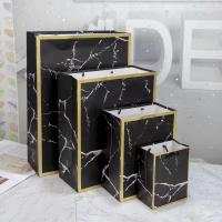China Lipack Marble Boutique Carrier Paper Bags With Rope Handle for sale
