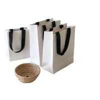 China Kraft Custom Printed Paper Bags 200-300gsm For Shopping Jewelry for sale