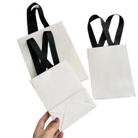 China Kraft Custom Printed Paper Bags 200-300gsm For Shopping Jewelry for sale