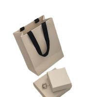 China Kraft Custom Printed Paper Bags 200-300gsm For Shopping Jewelry for sale