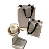 China Kraft Custom Printed Paper Bags 200-300gsm For Shopping Jewelry for sale