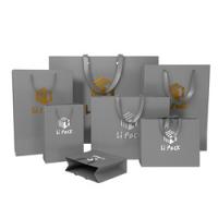 China Luxury Custom Printed Paper Bags For Wine Retail Shopping for sale