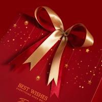 China Customized Printed Red Christmas Paper Bags with Ribbon Bow for sale