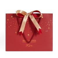 China Customized Printed Red Christmas Paper Bags with Ribbon Bow for sale