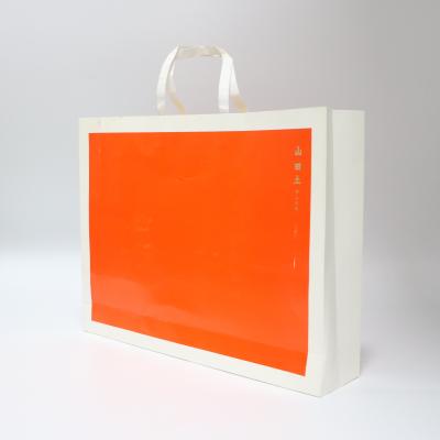 China Printing Customized Custom Printed Clothes and Shoes Paper Bags with Customized Design and CMYK/Pantone Colors for sale
